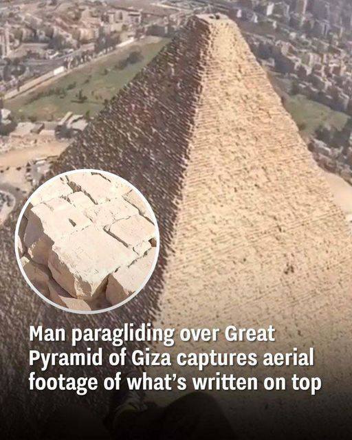 Man paragliding over the Great Pyramid of Giza captures aerial footage ...